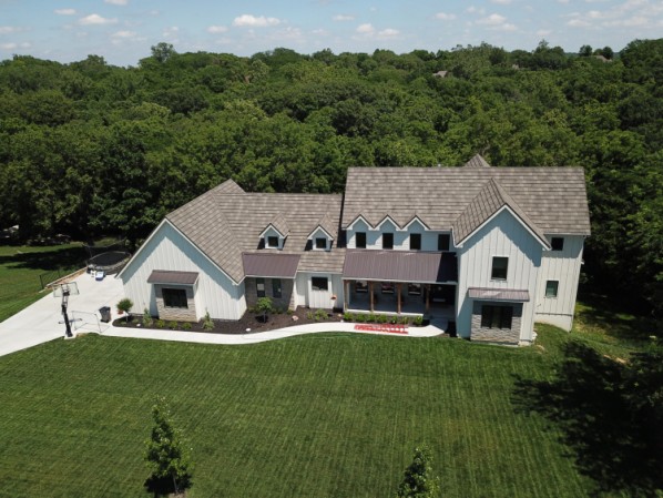 Design Tips for Using Mixed Roofing Materials on a Modern Home ...